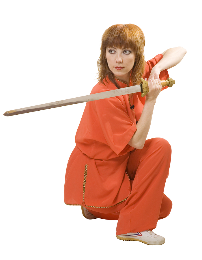 woman makes exercise with sword – Kung Fu and Tai Chi Magazine
